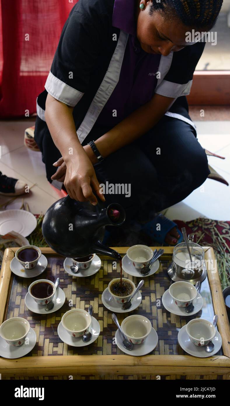 Pouring freshly brewed Ethiopian coffee. Addis Ababa, Ethiopia Stock ...