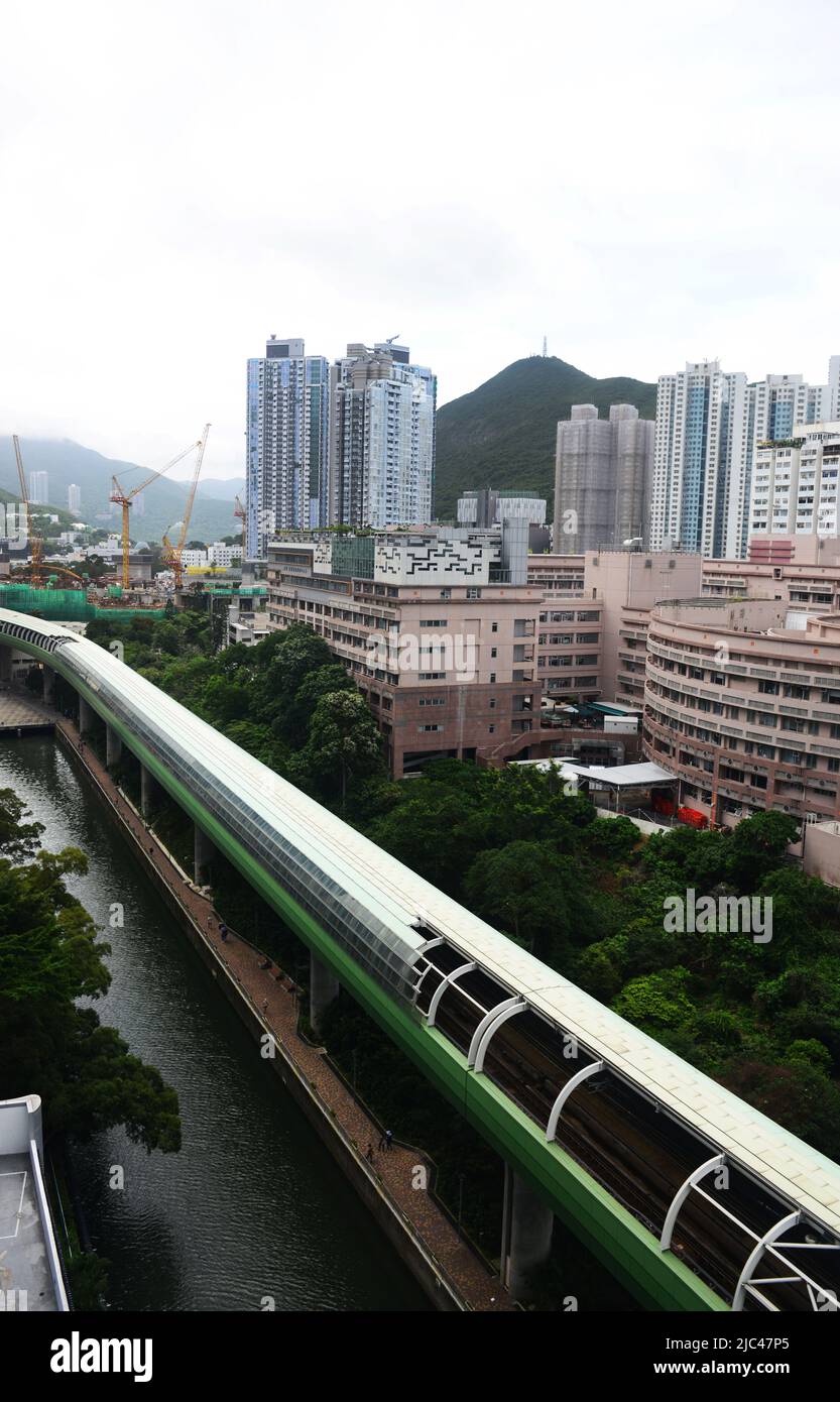 A view of the elevated MTR south island line tracks with residential ...