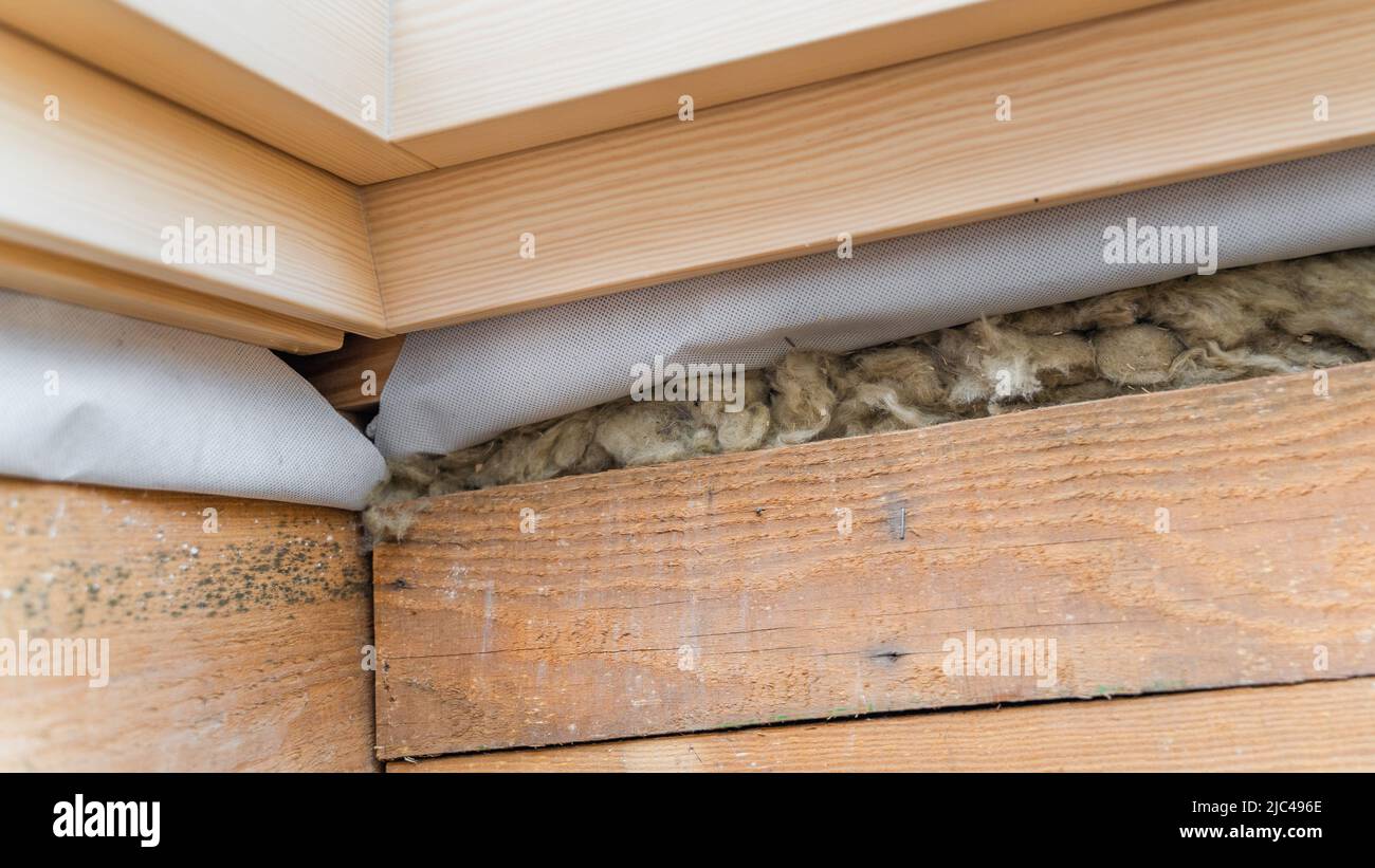 Mineral wool between wall and window close-up Stock Photo - Alamy