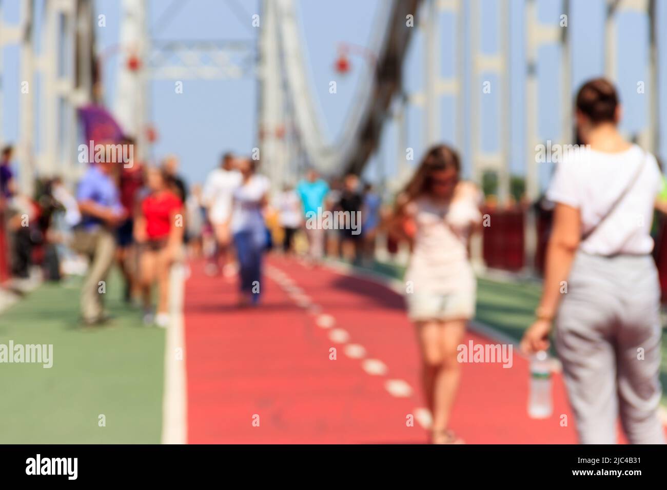 Blurred defocused abstract background of people walking on the city ...