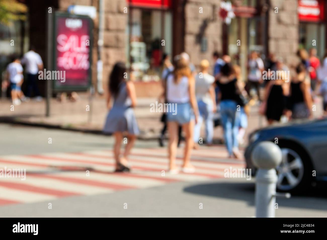 Blurred defocused abstract background of people walking on zebra ...