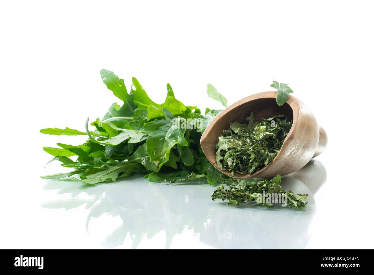 dried green organic arugula, seasoning, isolated on white background ...