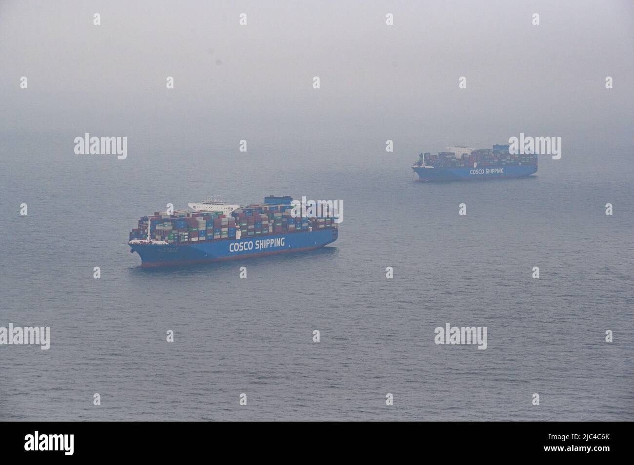 Hamburg, Germany. 09th June, 2022. The container ship CSCL Uranus (l-r ...