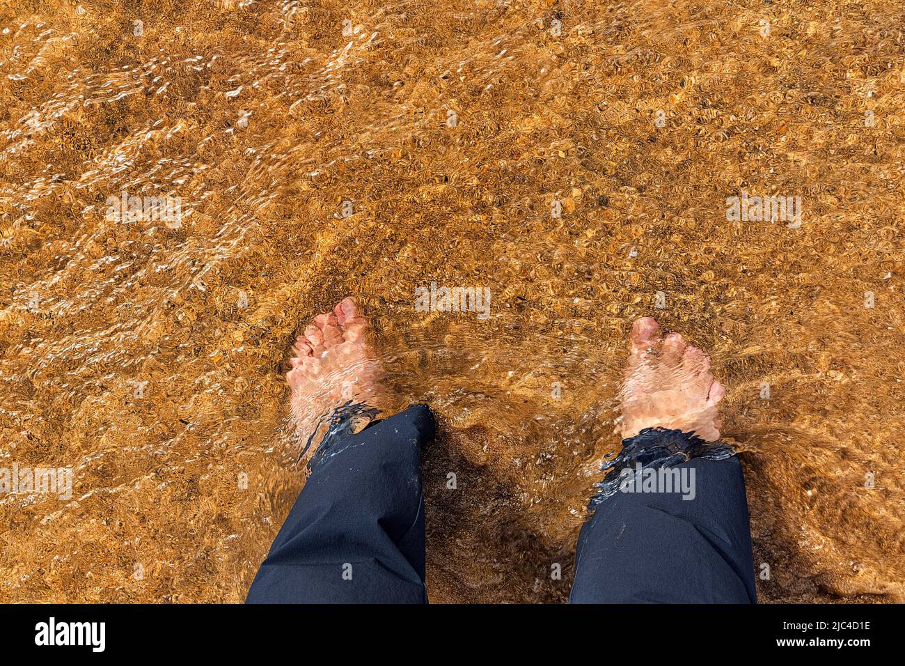 Feet in the water hi-res stock photography and images - Alamy