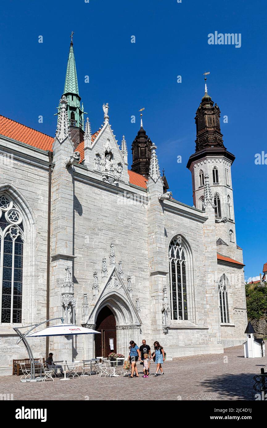 Tourists in front of the medieval cathedral, Saint Mary's Church, Visby ...