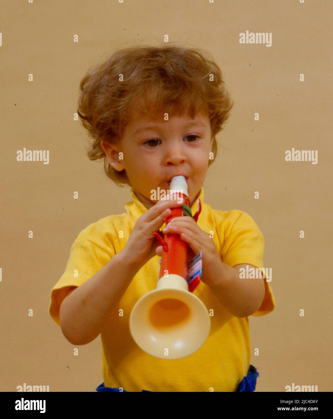 Small boy with trumpet, noise doer, noise, Small boy with trumpet ...