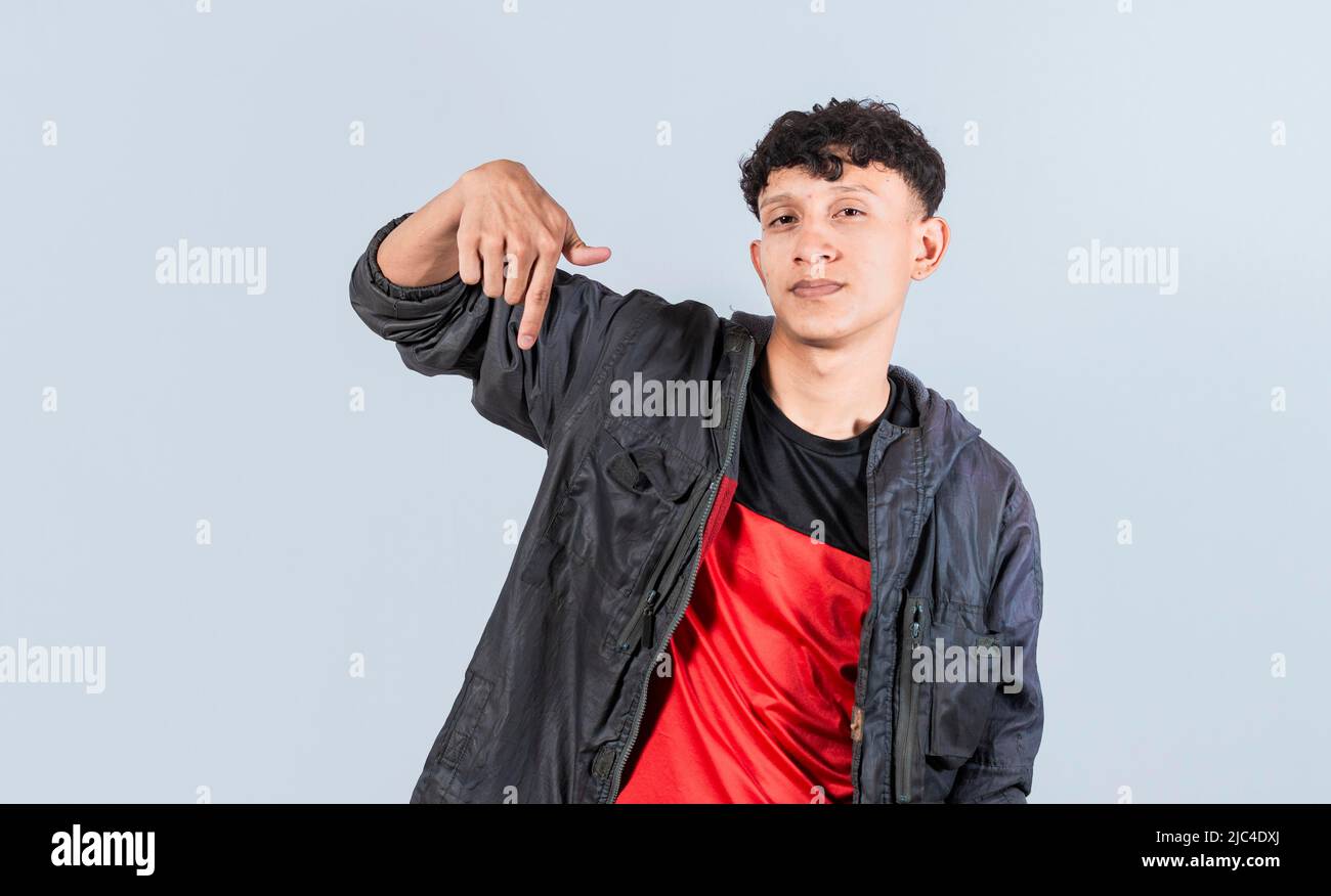 Friendly guy pointing down on isolated background, friendly guy ...