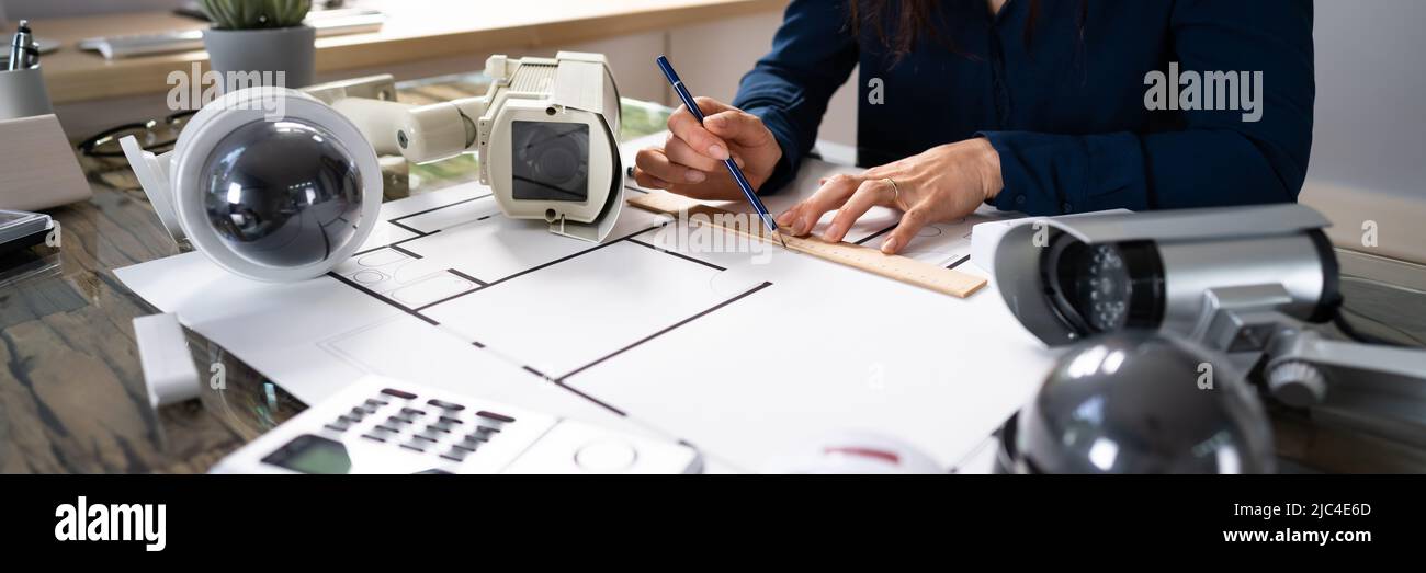 Close-up Of An Architect's Hand Drawing Blueprint With Security ...