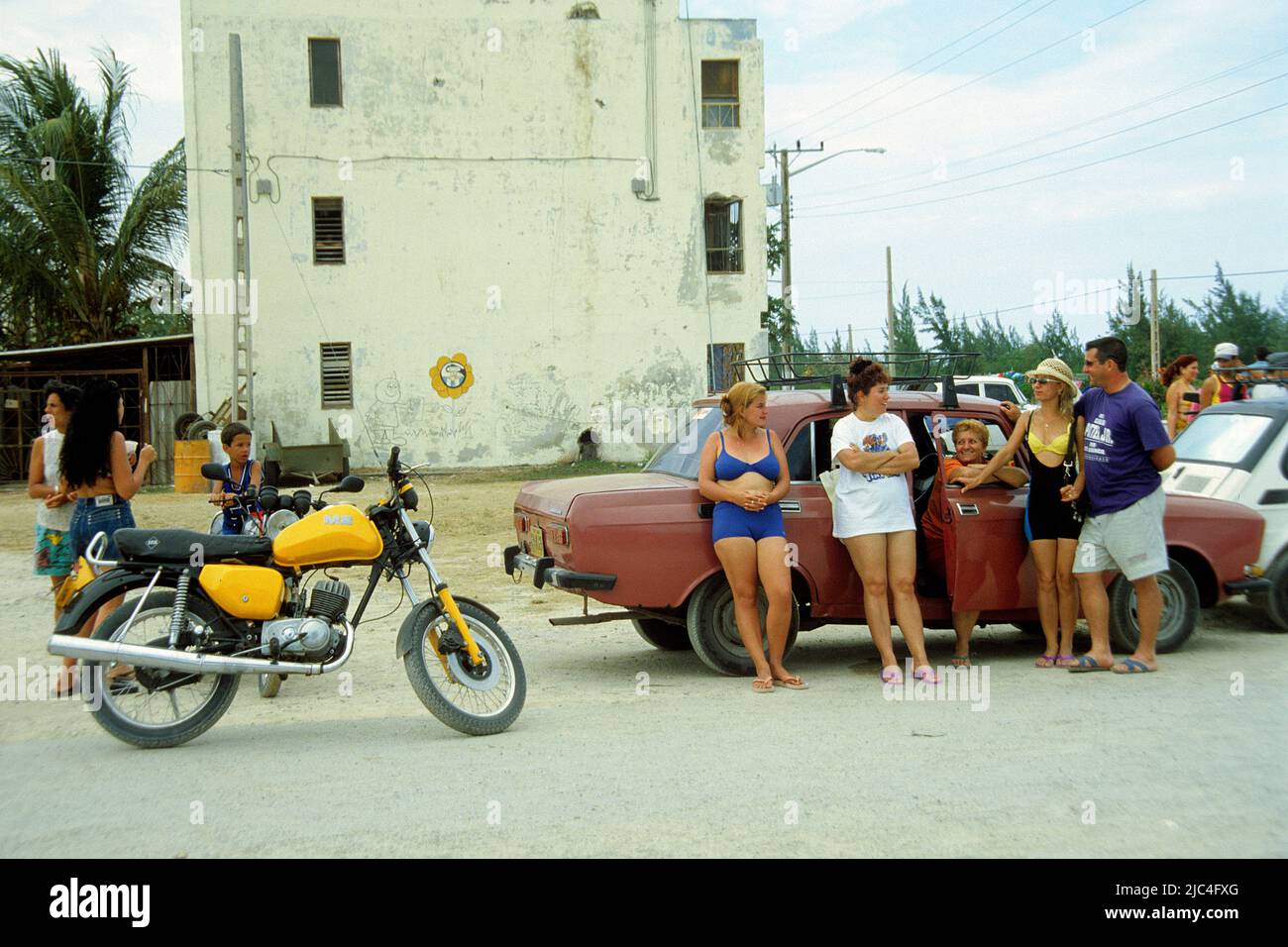 Streetlife, cuban people with classic car and MZ motorbike, St. Lucia ...