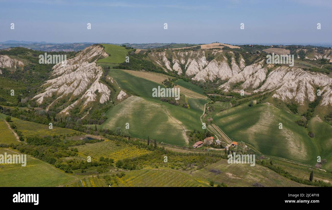 Aerial view of a hilly landscape with erosion valleys, Brisighella ...