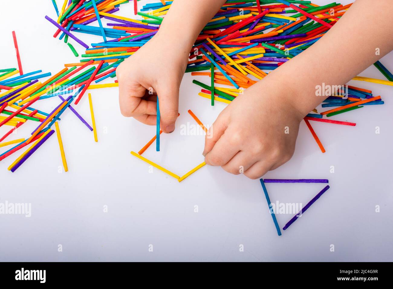 Kid triangle hi-res stock photography and images - Alamy