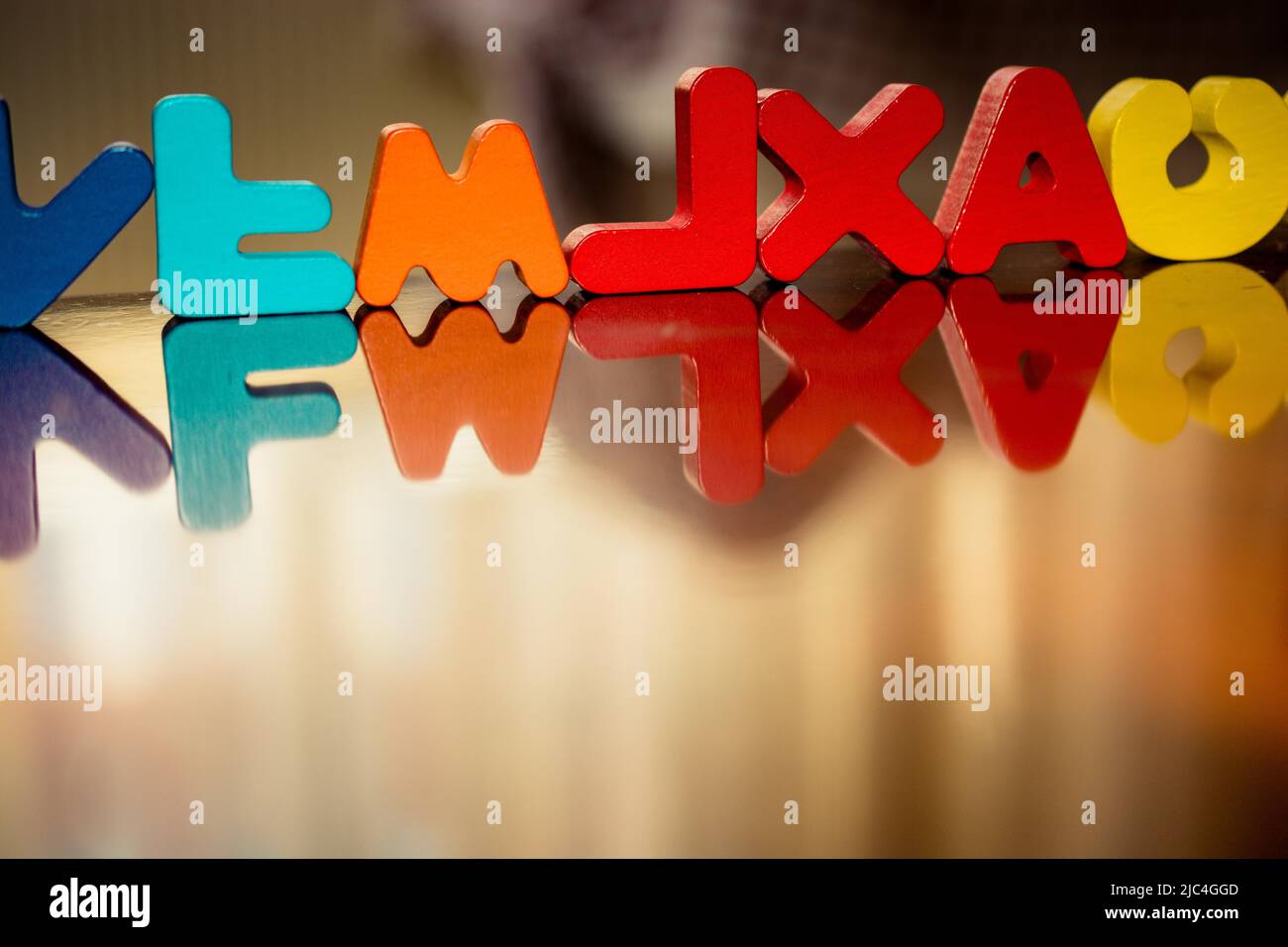 Colorful Letter cubes of Alphabet made of wood Stock Photo - Alamy