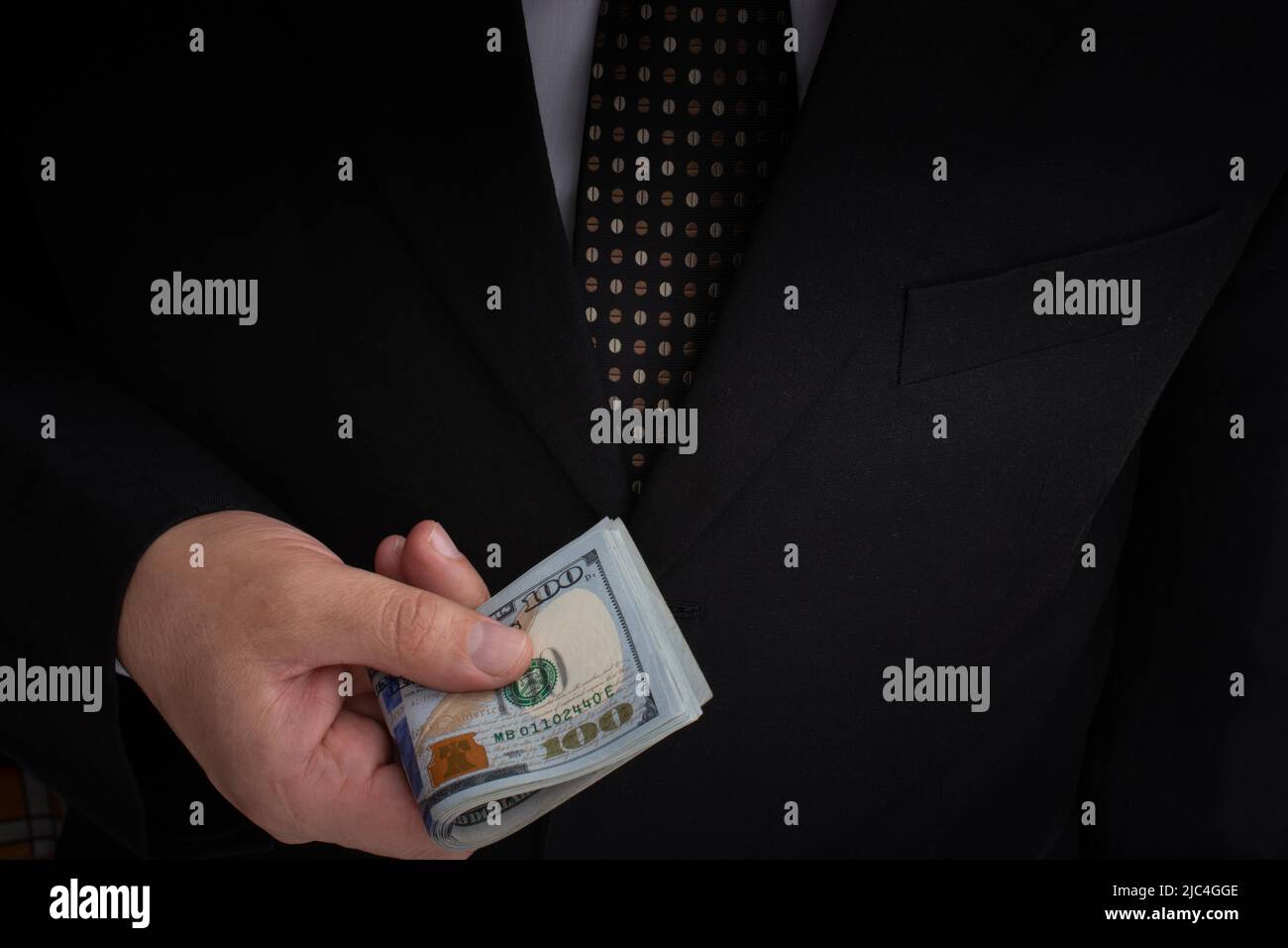 Businessman holding US dollar banknote money on white background Stock ...