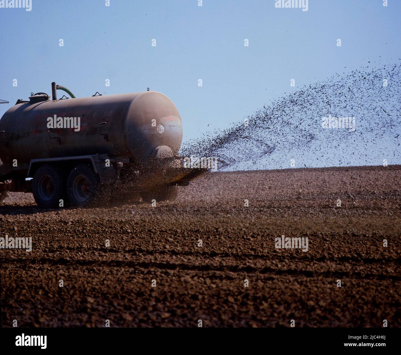 Tractor trailer, slurry, field Fertilisation in spring Stock Photo - Alamy