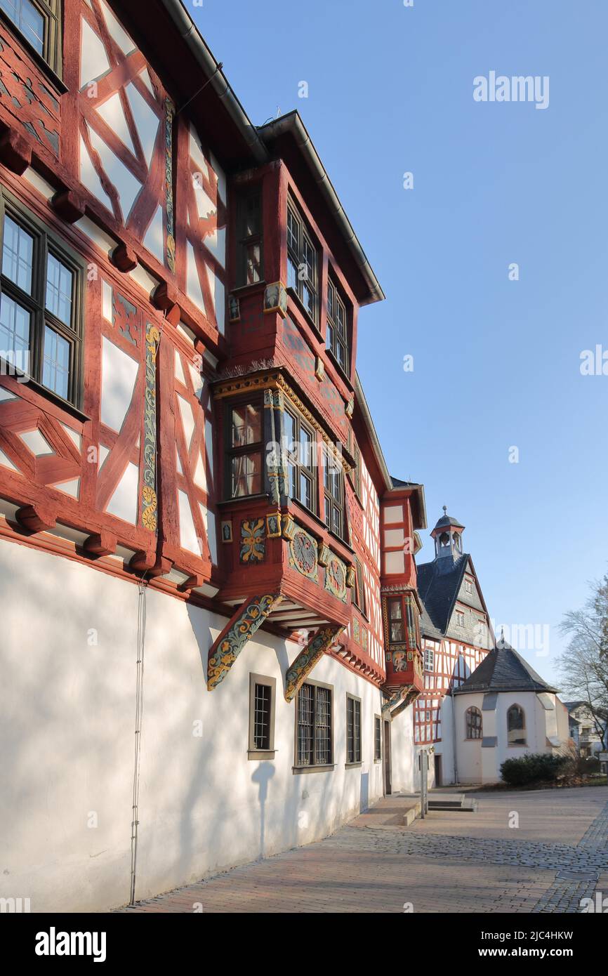 Facade with ornate bay window and wood carving on the historic Amthof ...