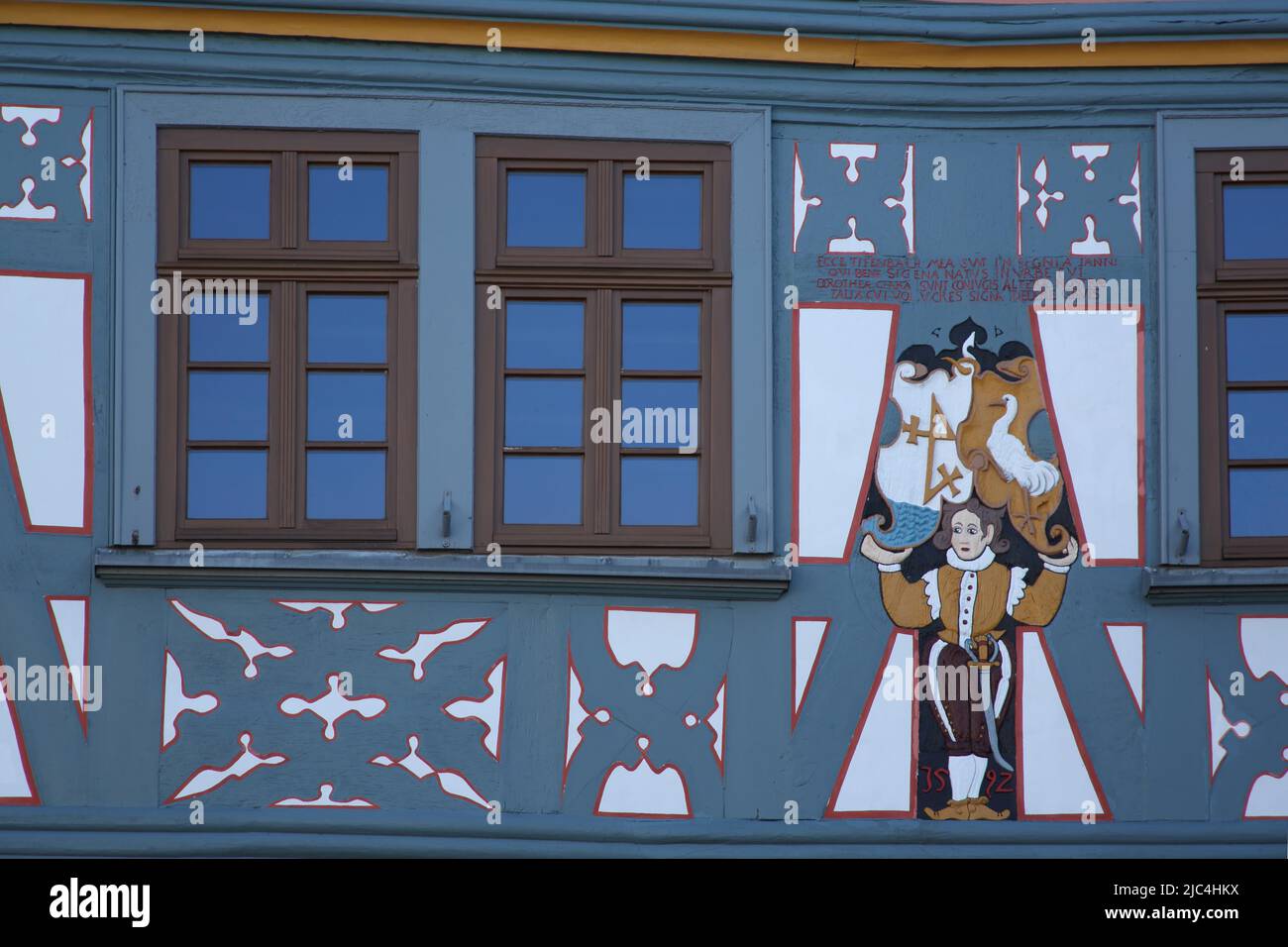 Detail as a wood carving of the half-timbered house on the market ...