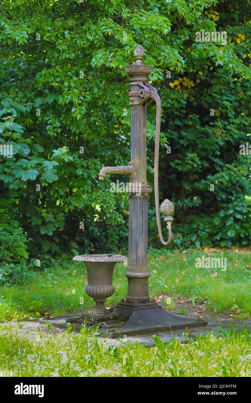 Old fountain with hand pump, water pump, park of the Villa Louis ...