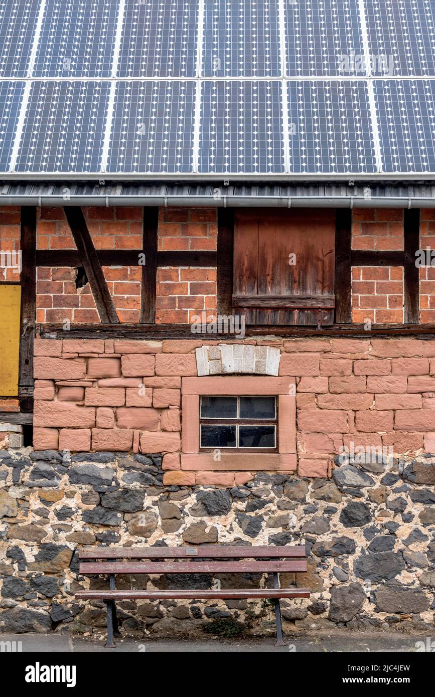 Historic farmhouse with photovoltaic system, solar panels on the roof ...