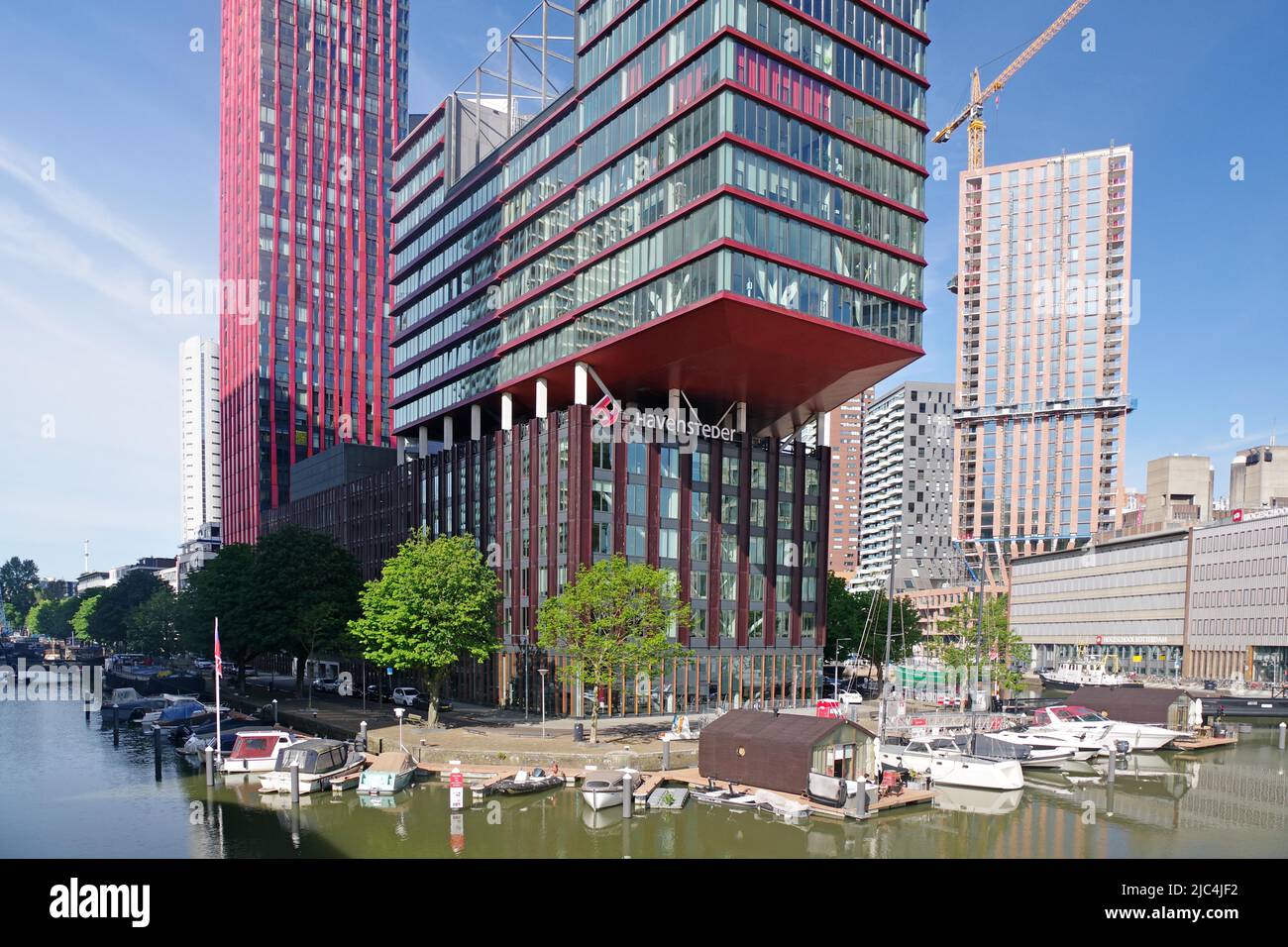 Futuristic architecture, skyscrapers with glass facades, canal ...