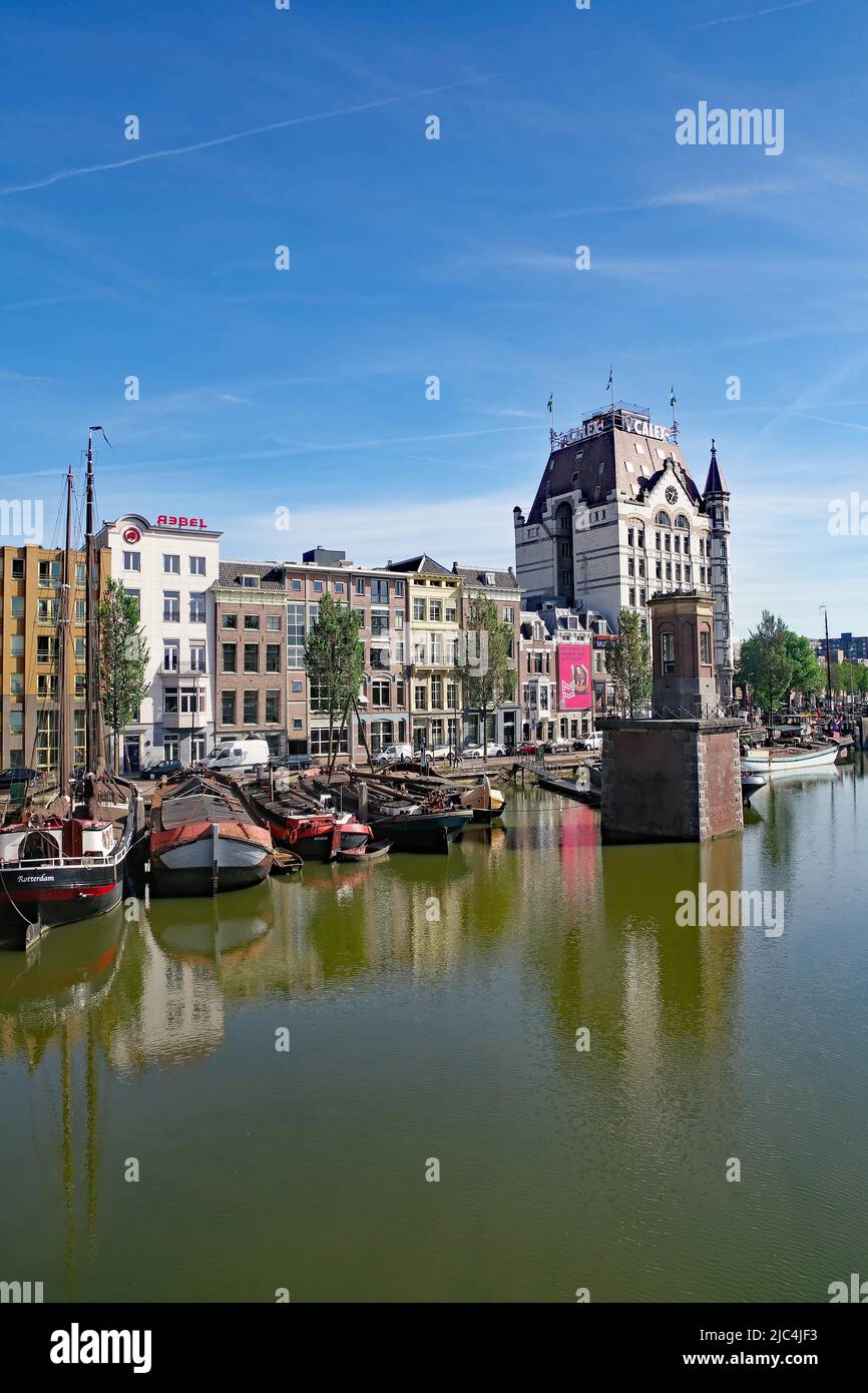 Houseboats and ships in the calm waters of a canal, Rotterdam, South ...
