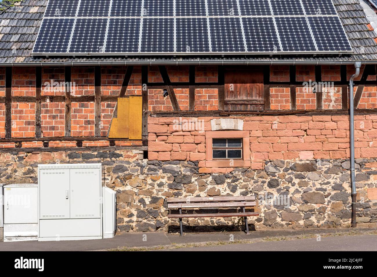 Historic farmhouse with photovoltaic system, solar panels on the roof ...