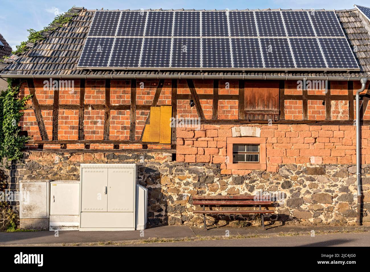 Historic farmhouse with photovoltaic system, solar panels on the roof ...