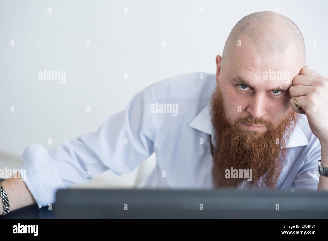 Angry unshaven businessman chief boss hi-res stock photography and ...
