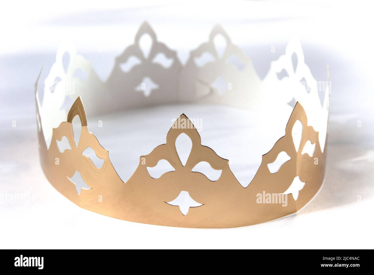 Gold paper king crown isolated on white background Stock Photo - Alamy