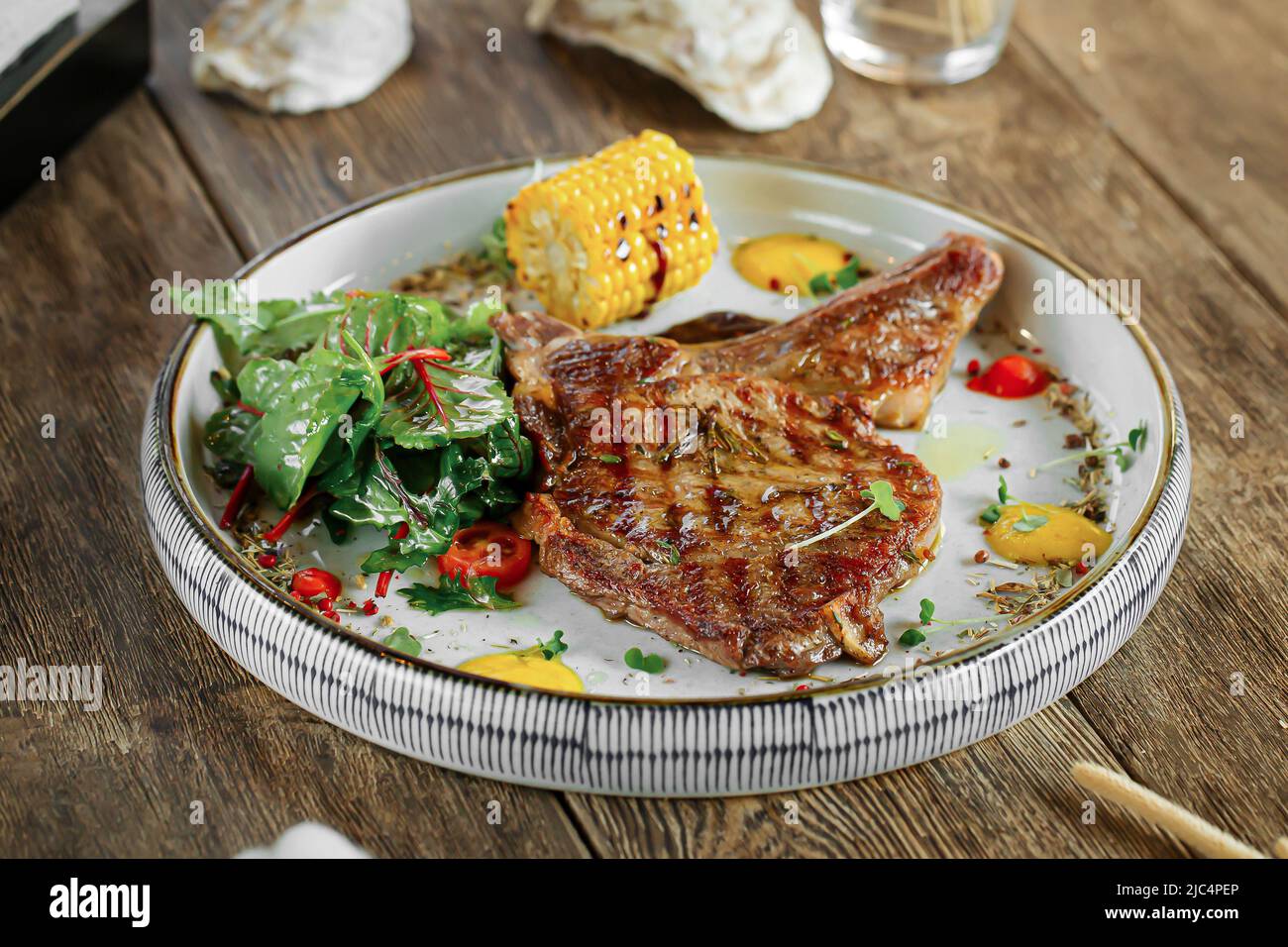 Portion of gourmet grilled beef steak Stock Photo - Alamy
