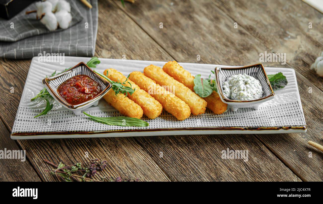 Breaded cheese sticks hi-res stock photography and images - Alamy