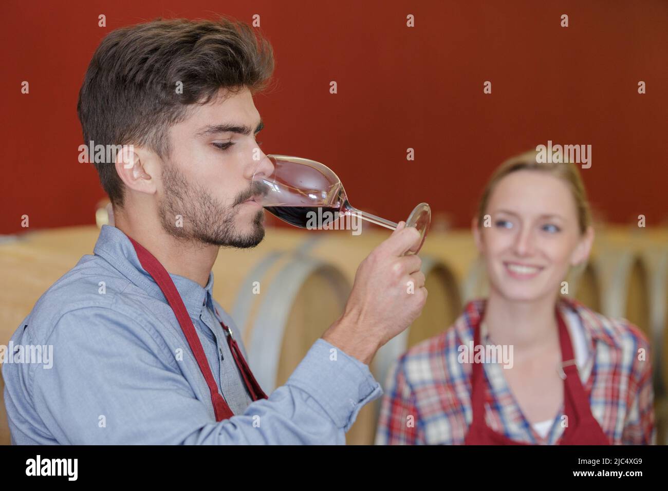man sampling wine in cellar Stock Photo - Alamy