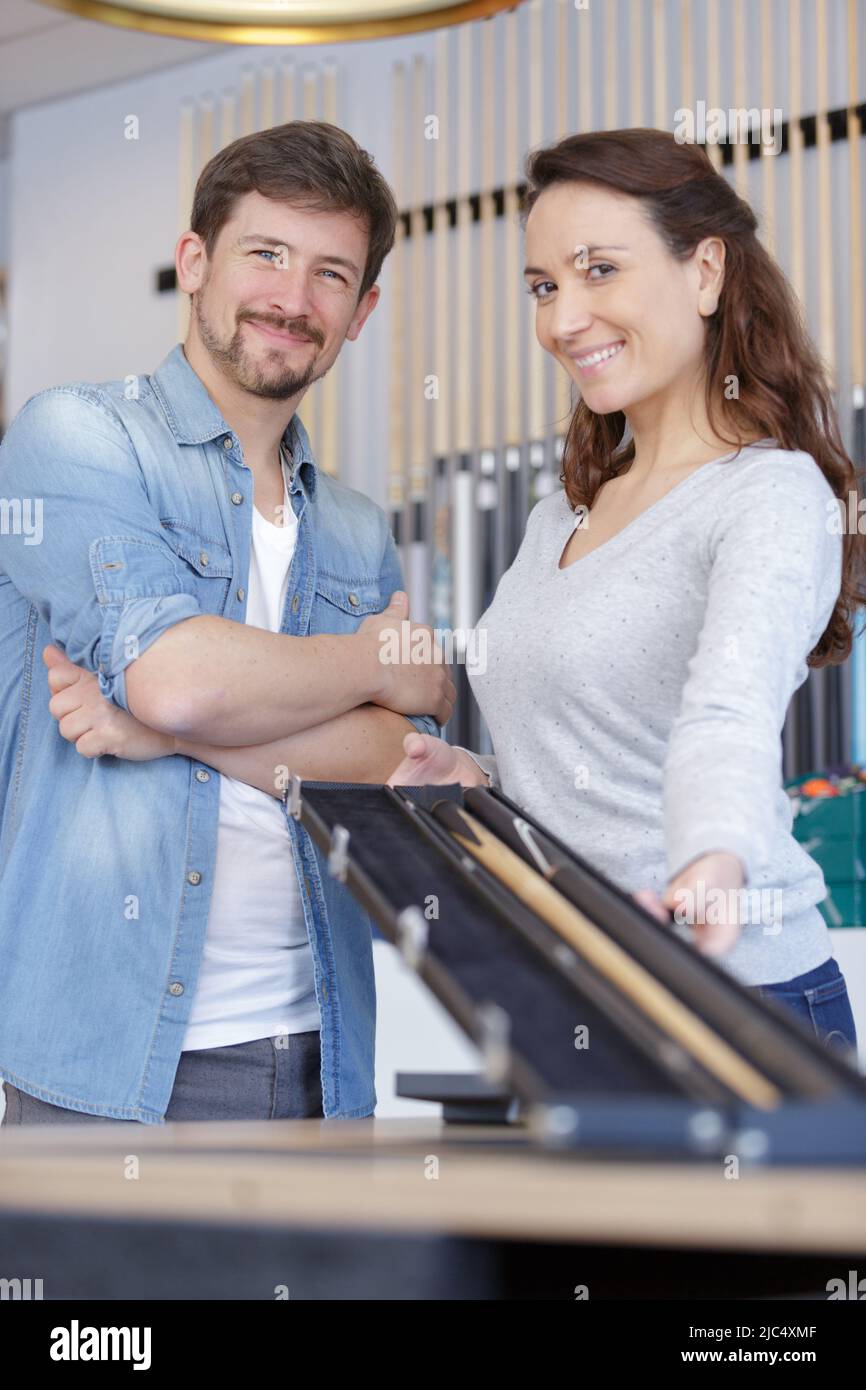 happy friends playig pool together Stock Photo - Alamy