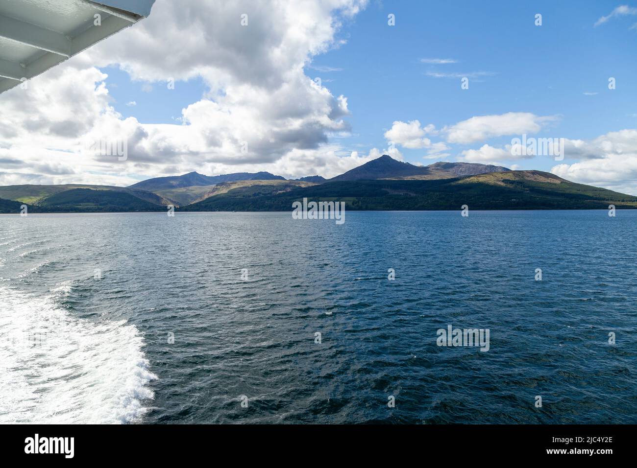 Sailing away from Brodick harbour and the Isle of Arran on a CalMac ...
