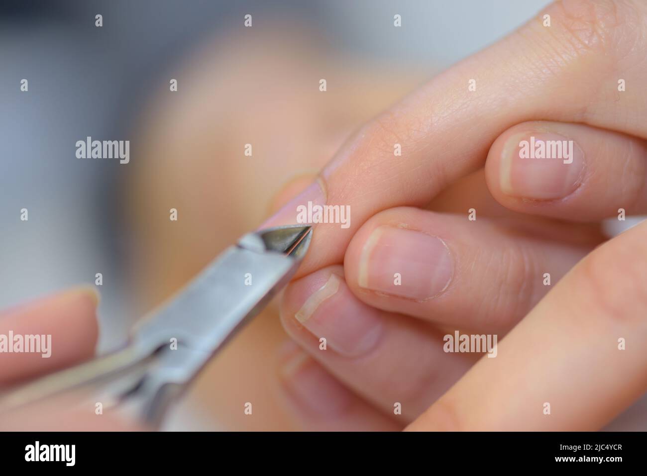 Doing manicure hand young woman hi-res stock photography and images - Alamy