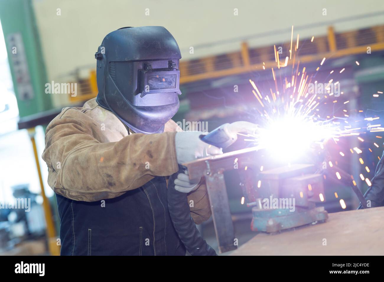 welder welding steel frame Stock Photo - Alamy