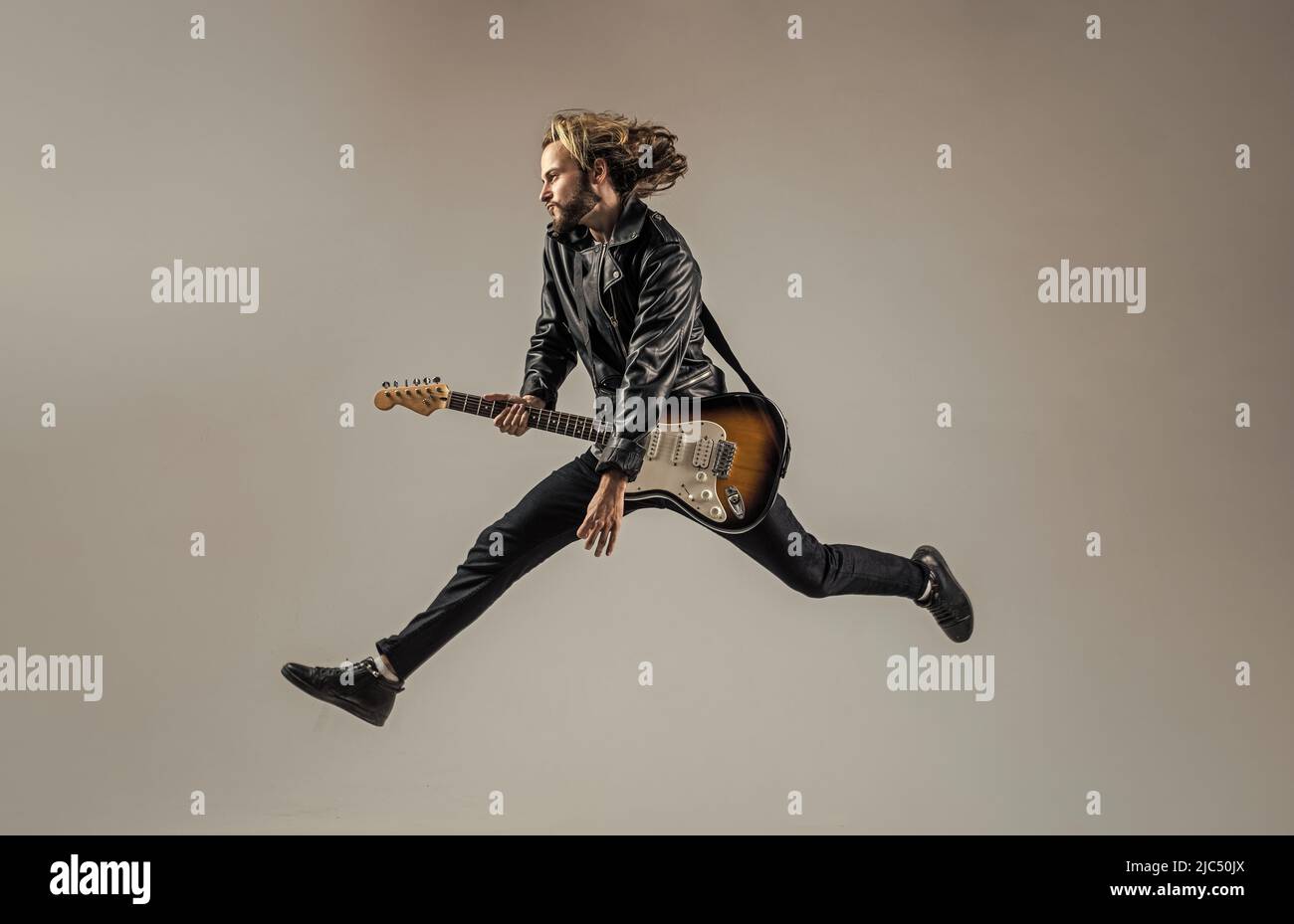 Emotional bearded rocker in hi-res stock photography and images - Alamy