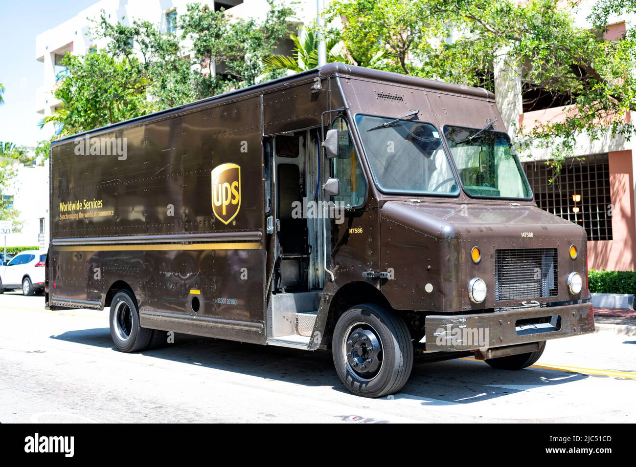 Miami Beach, Florida USA - April 14, 2021: united parcel service, corner view. brown postal ...