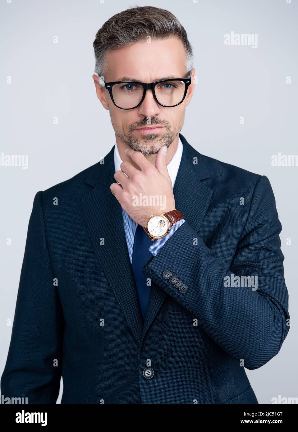 charismatic mature leader in formal business suit and spectacles Stock ...