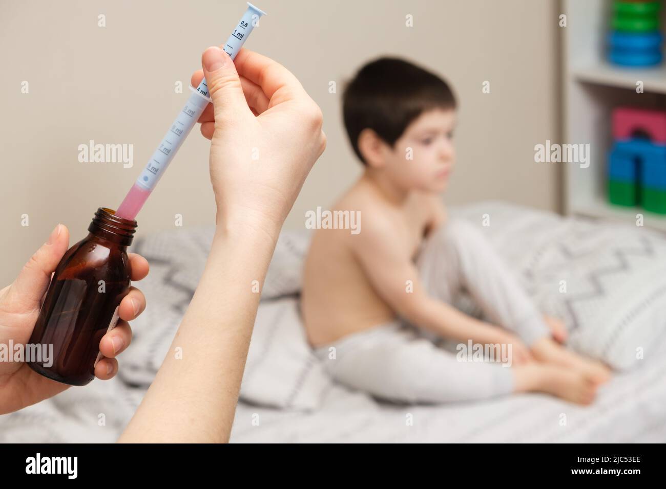Cough syrup child hi-res stock photography and images - Alamy