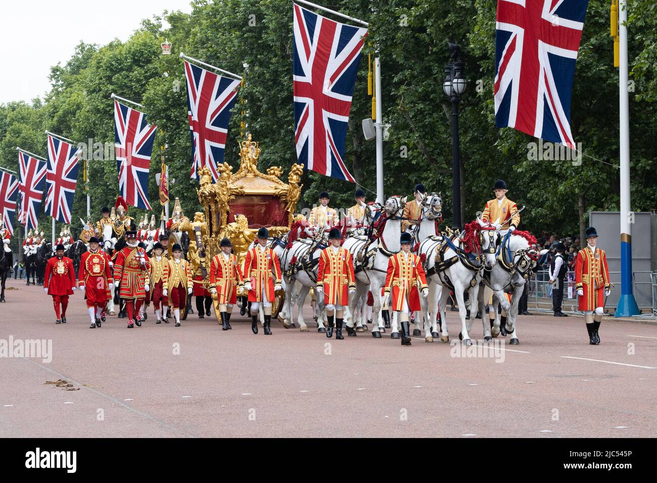5 June 2022 - Queen Elizabeth II golden state coach moves along the ...