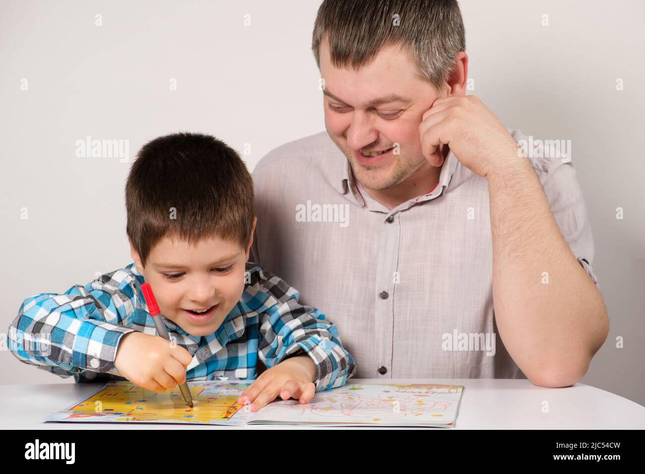 Father and son go through labyrinths, perform tasks for logic and the ...