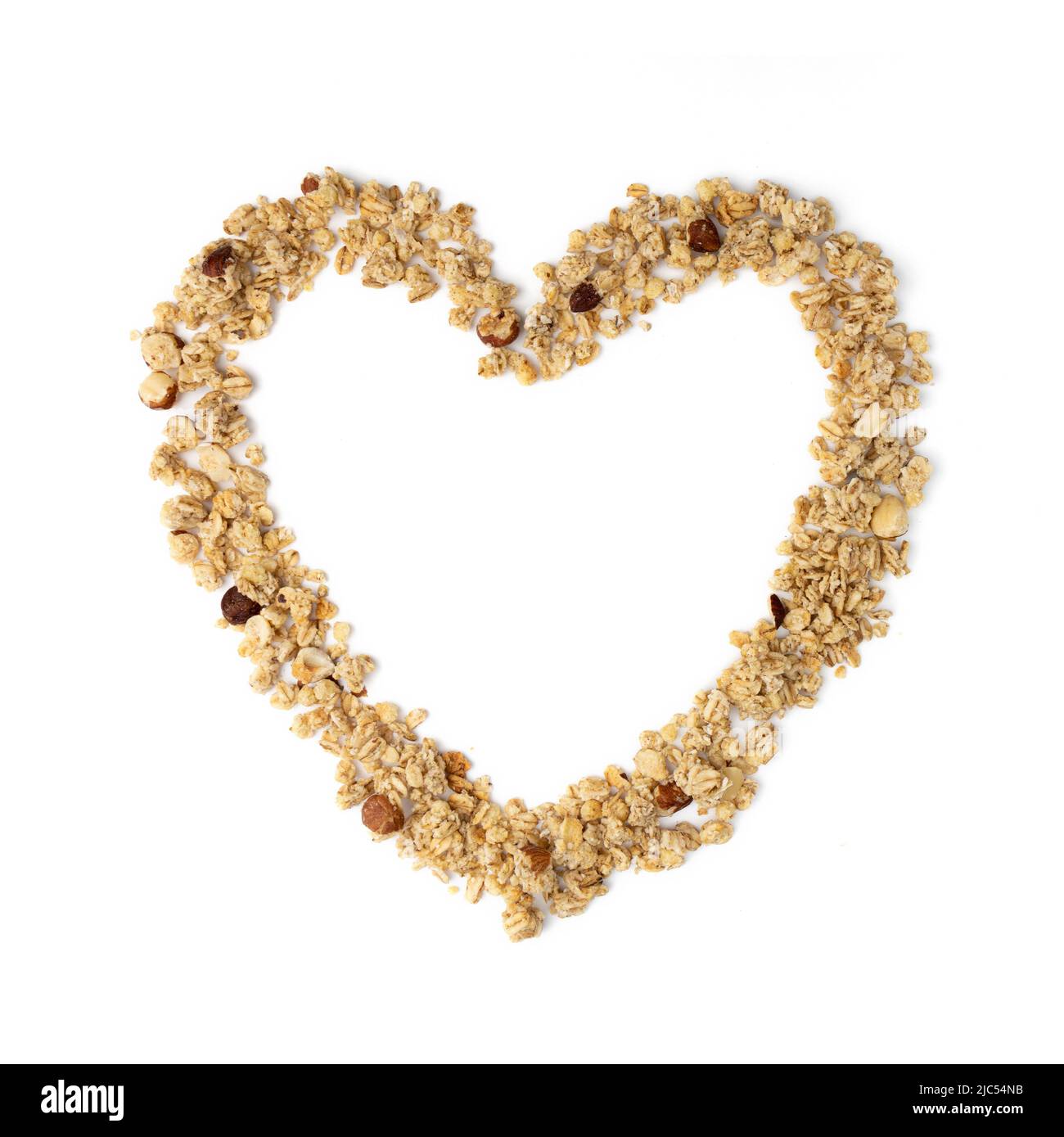 shape of heart of granola musli with nuts isolated on white background ...