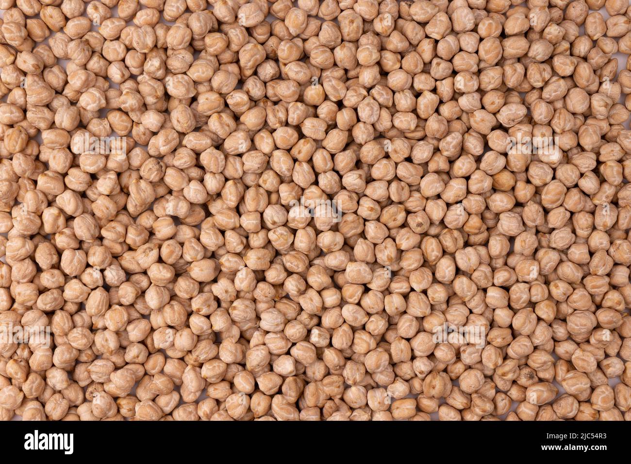 chickpea background, healthy vegetarian food concept, pile of uncooked ...