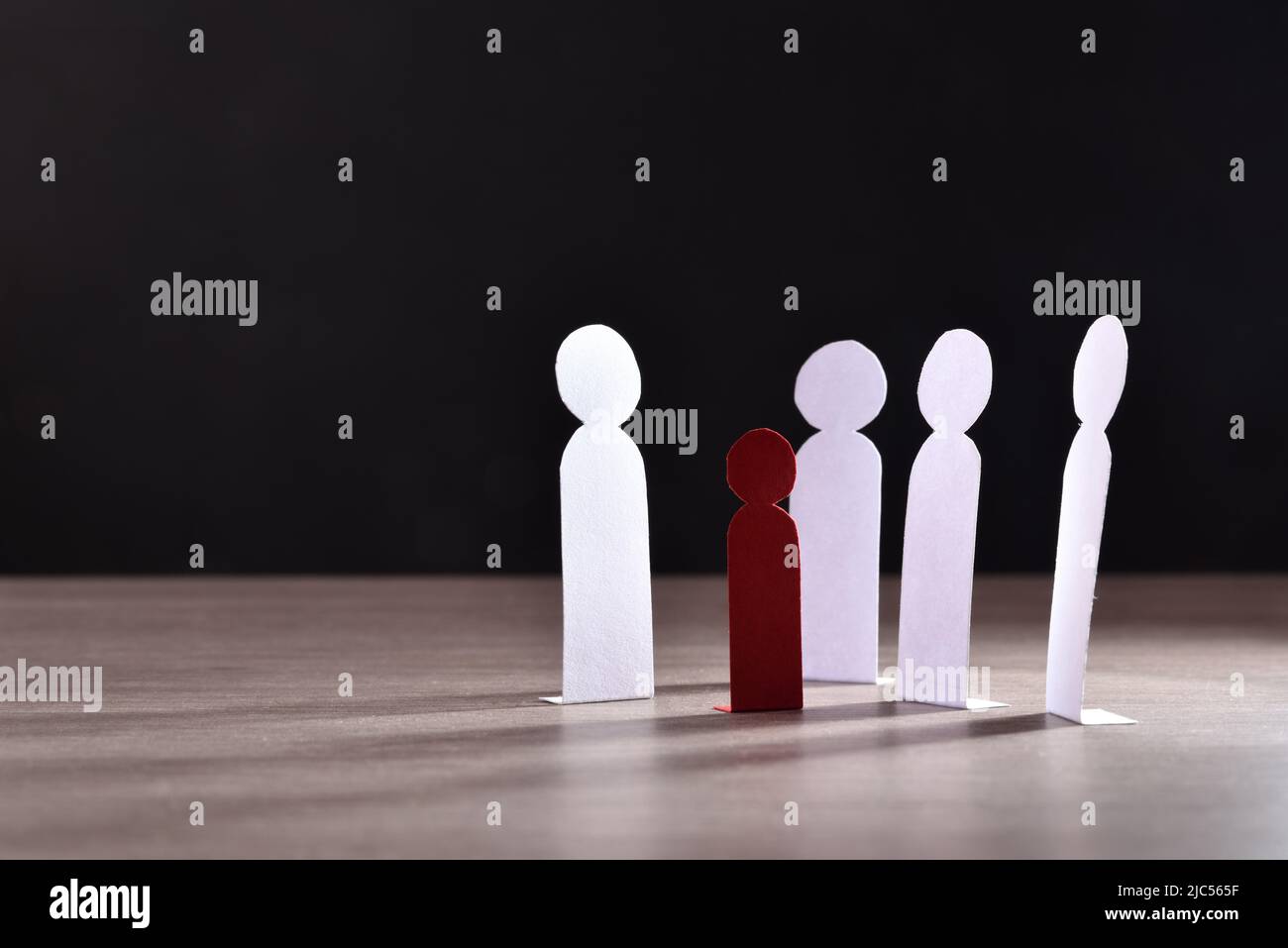 Concept of abuse with cutouts of schoolchildren with young people ...