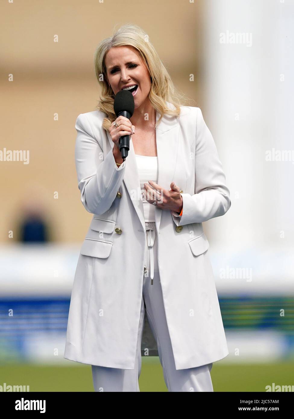Lizzie Jones singing the national anthem before the start of the day's ...