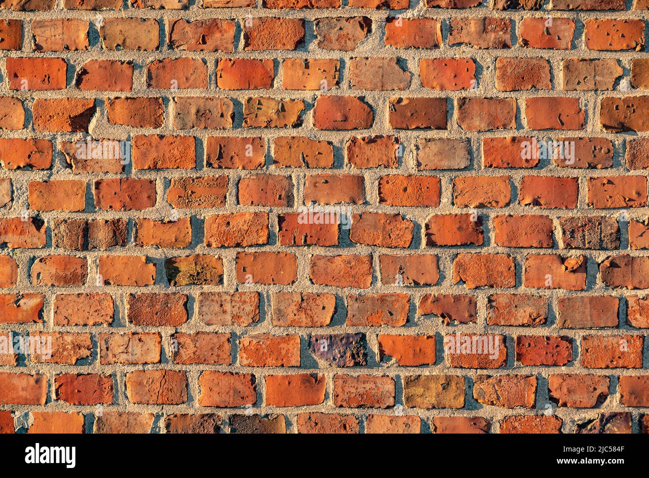 Red brick wall background, a beautiful architectural texture of an old ...