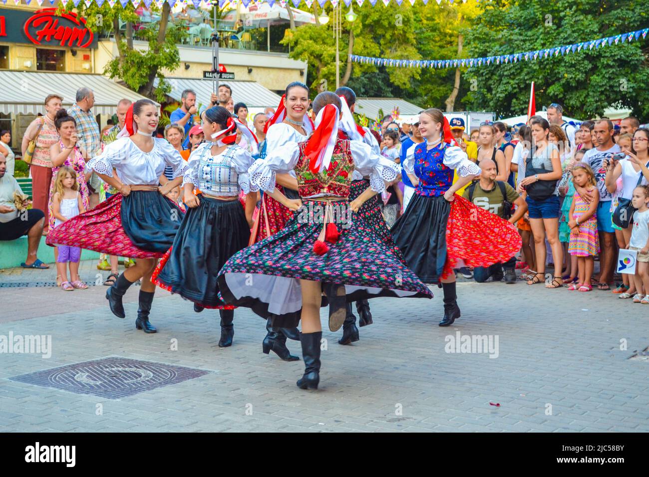 Slovakian dancers dressed in traditional costumes performing at street ...