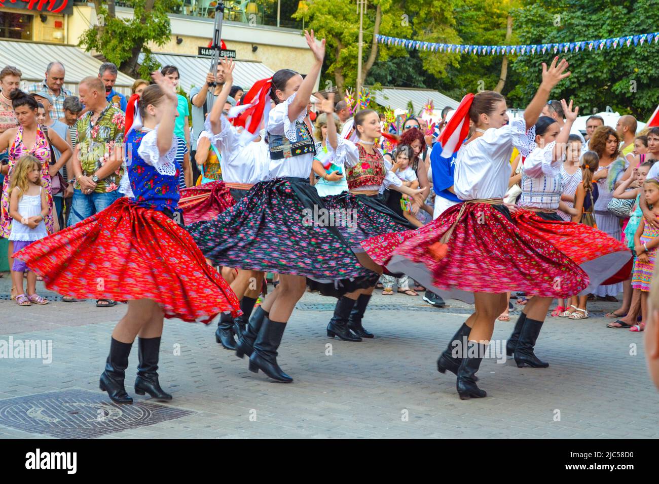 Slovakian dancers dressed in traditional costumes performing at street ...
