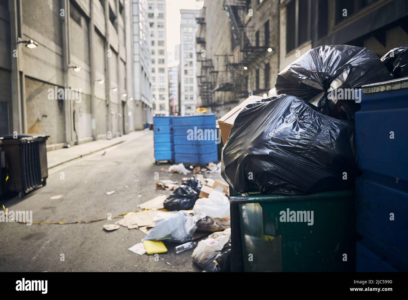 Bin in alley hi-res stock photography and images - Alamy
