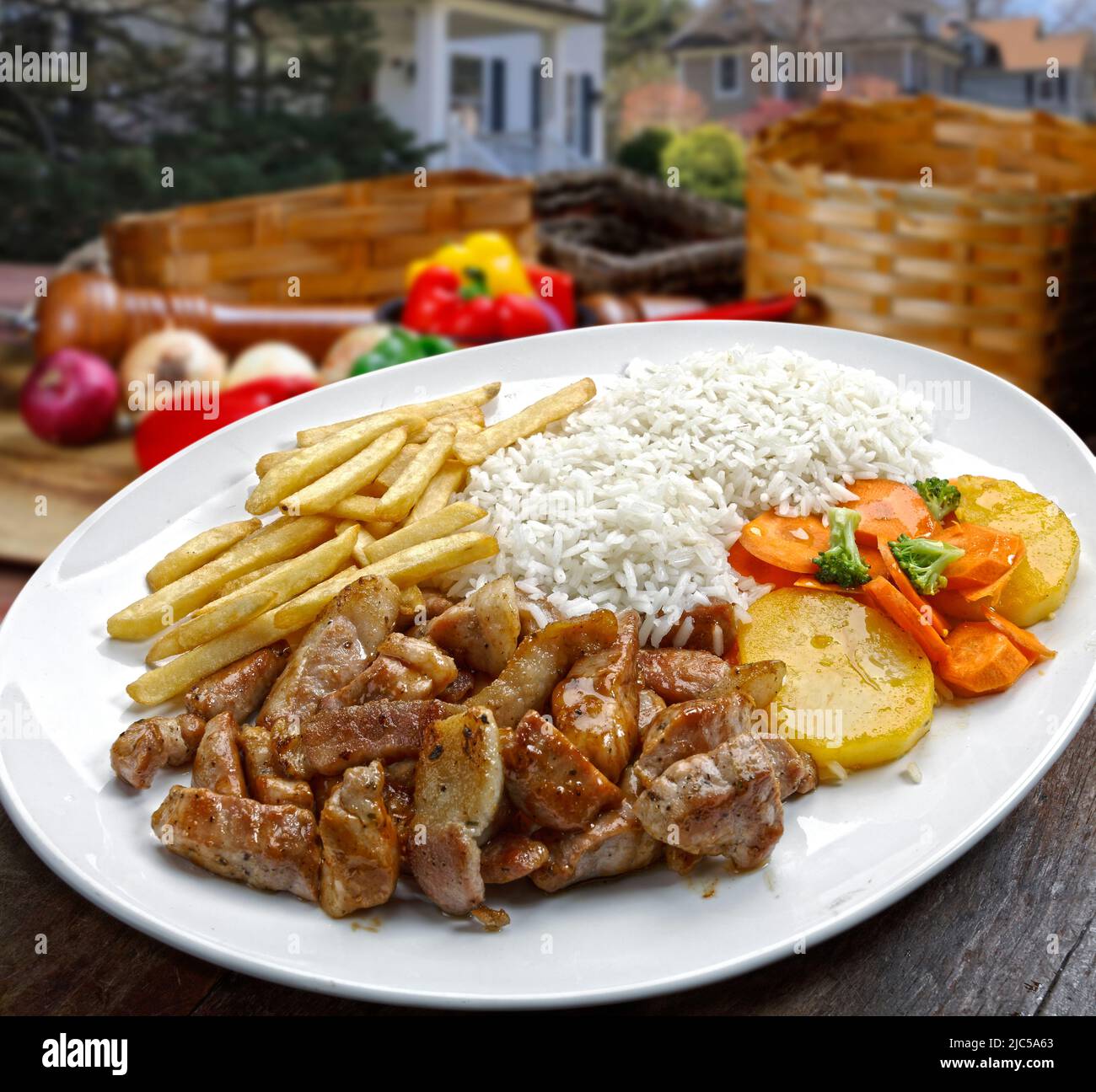 Roast Beef with French Fries, rice Stock Photo - Alamy